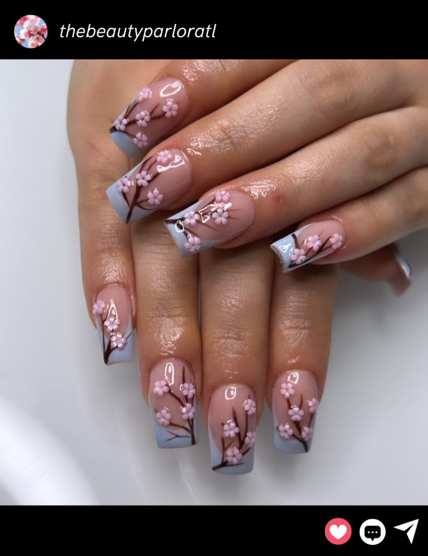 You're about to see cherry blossom nails everywhere thanks to Hailey